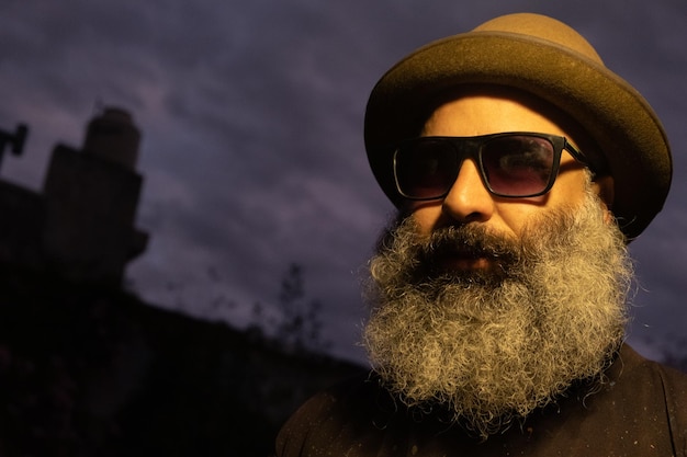 Premium Photo Close Up Portrait Of Cool Bearded Man Wearing Hat And