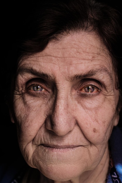 Premium Photo | Close-up portrait of senior woman Premium Photo | Close-up portrait of senior woman
