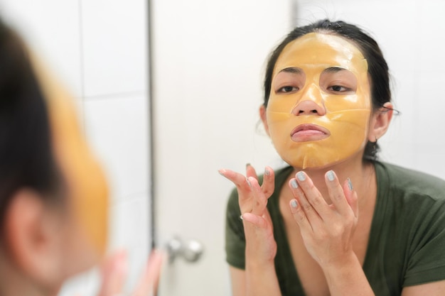 Premium Photo | Close-up of woman applying facial mask Premium Photo | Close-up of woman applying facial mask
