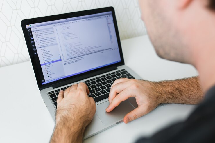 Premium Photo | Closeup coding on screen, man hands coding html and programming on screen laptop ...