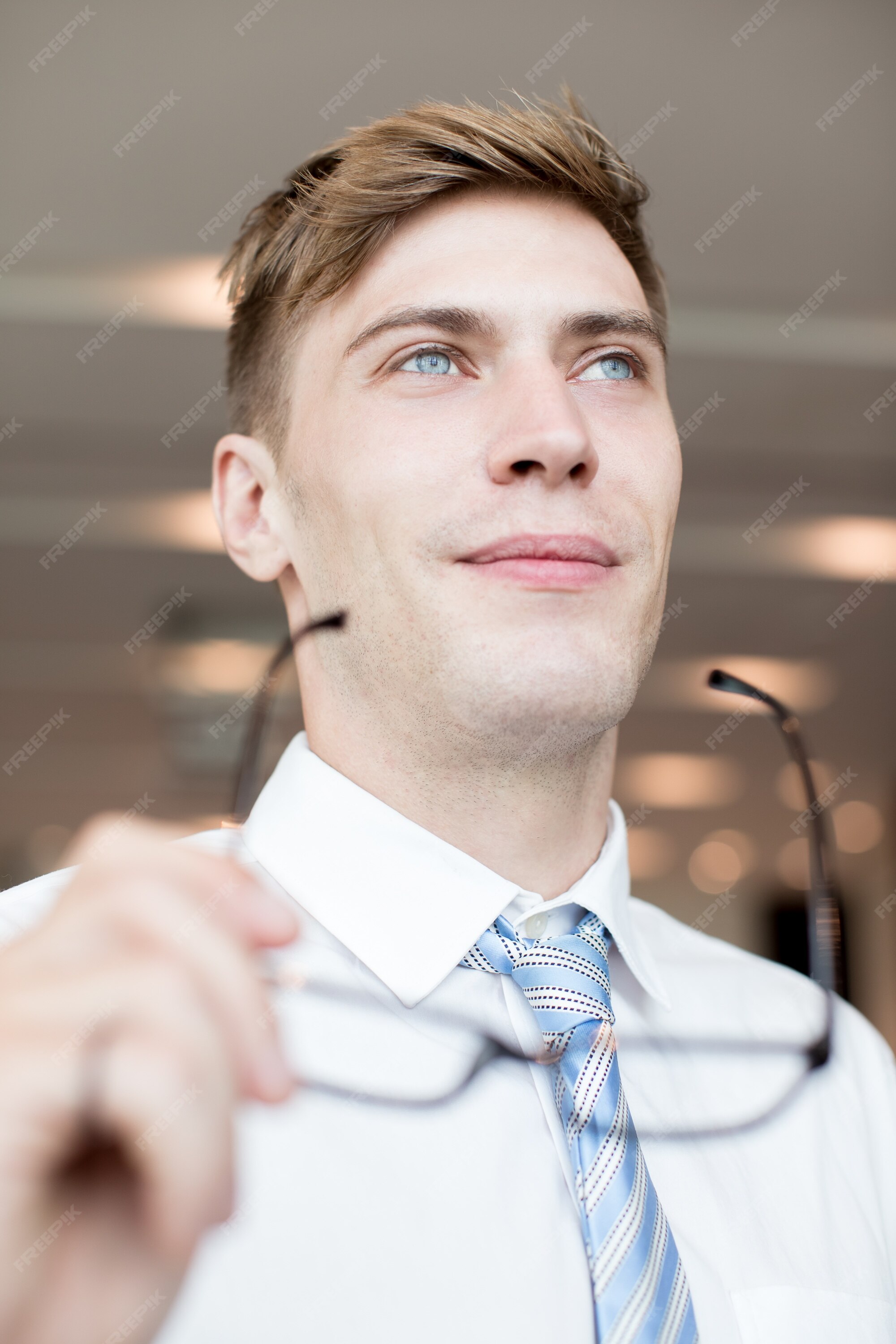 Premium Photo Closeup Of Content Business Man Taking Off Glasses