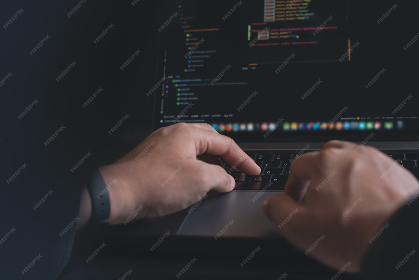 Premium Photo | Closeup image of programmer coding javascript on laptop computer