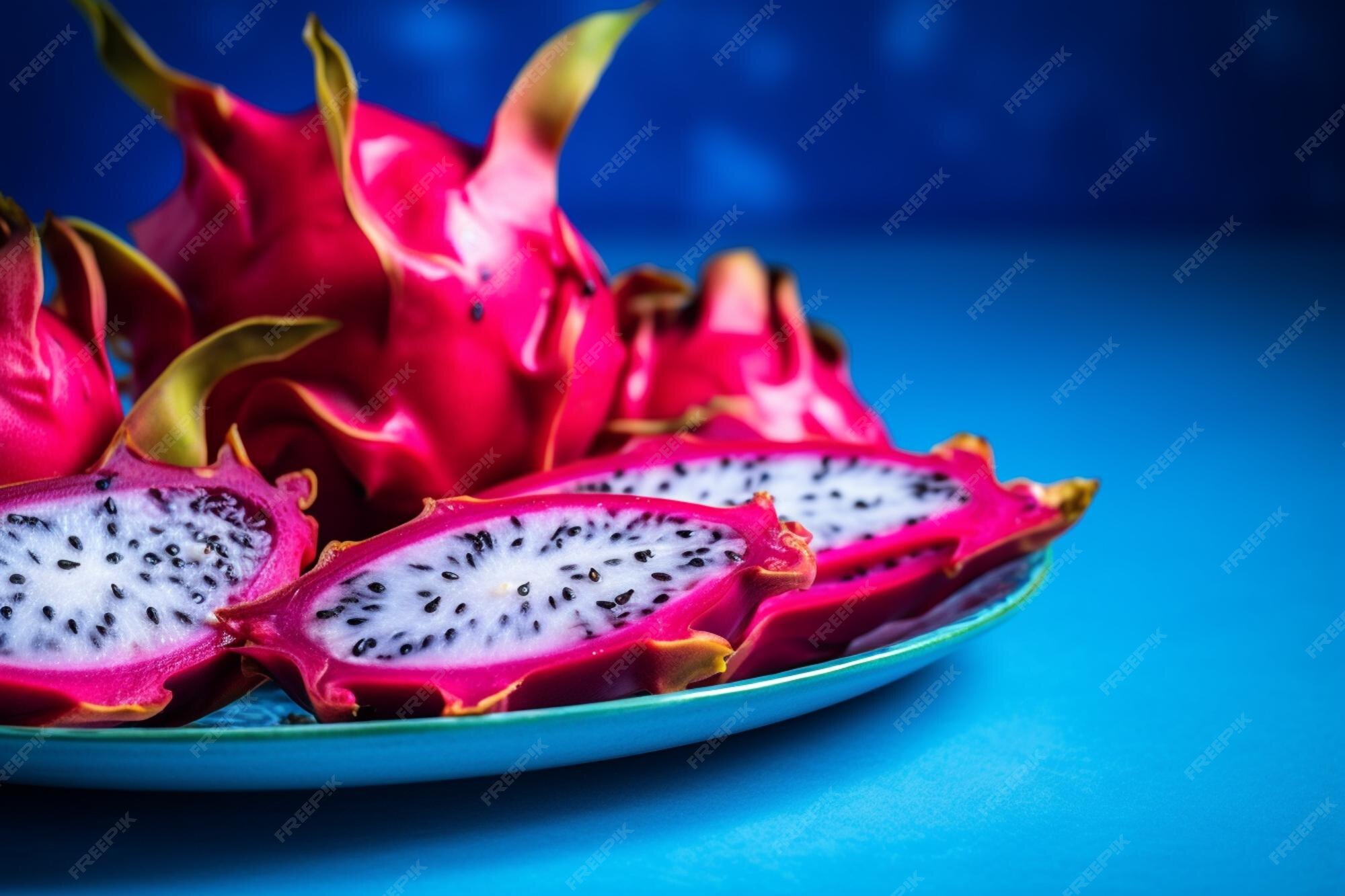 Premium Photo | Closeup of a plate of dragon fruit slices on blue ... Premium Photo | Closeup of a plate of dragon fruit slices on blue ...