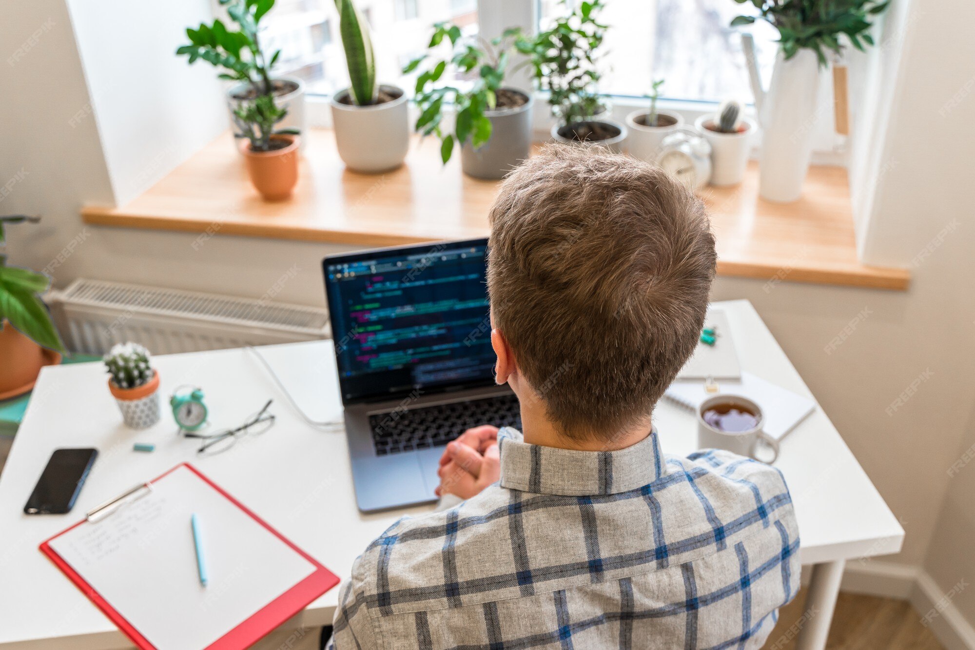 Premium Photo | Coding on screen man's hands coding and programming on ...