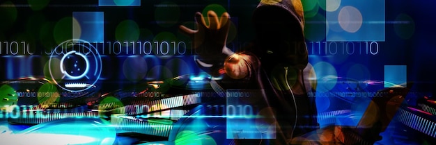 Premium Photo | Composite image of hacker holding laptop while gesturing Premium Photo | Composite image of hacker holding laptop while gesturing