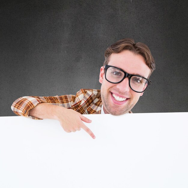 Premium Photo | Composite image of nerdy businessman pointing to poster Premium Photo | Composite image of nerdy businessman pointing to poster
