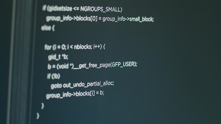Premium Photo | Computer of system engineer showing source code and big ...