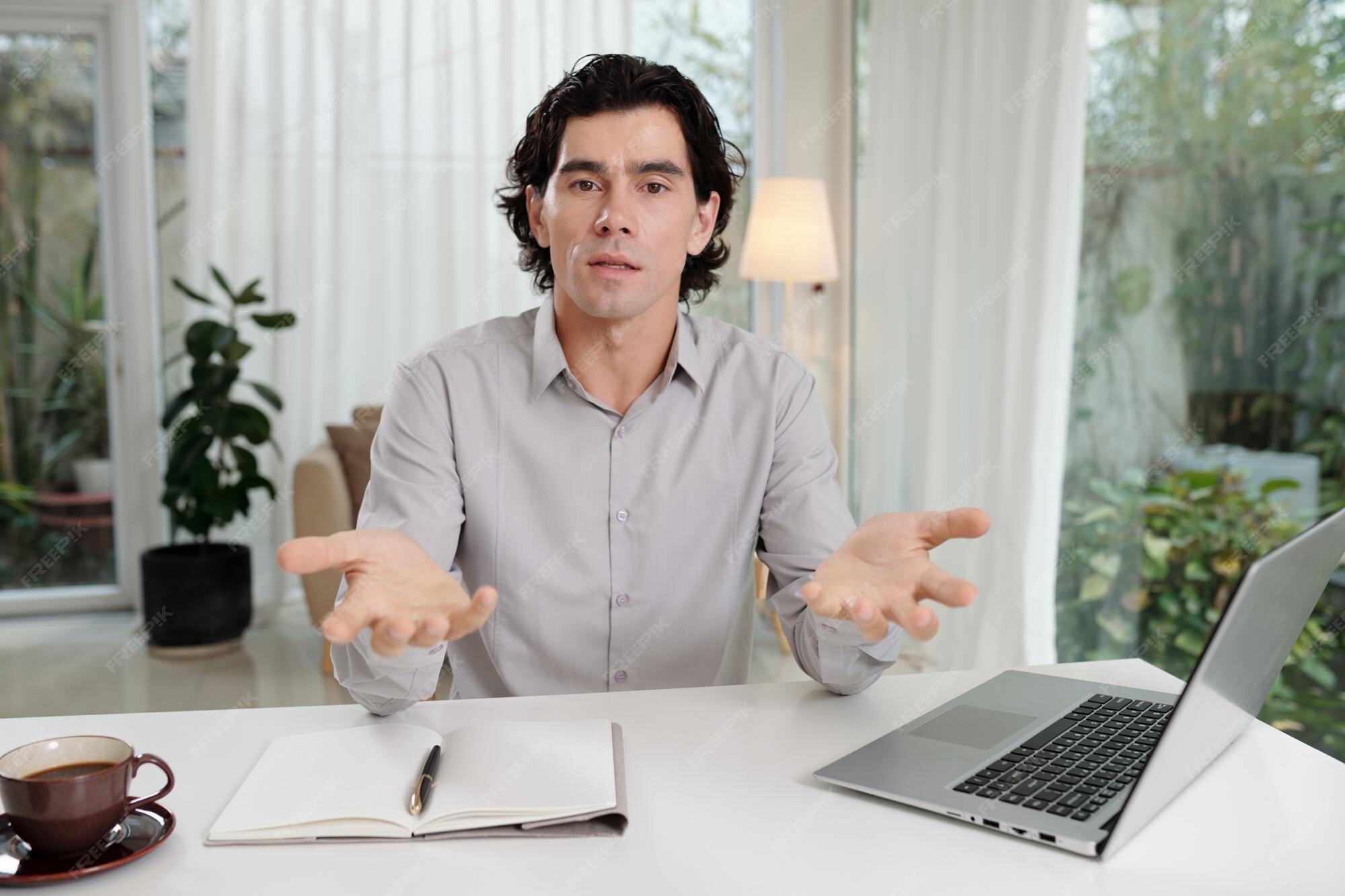 Premium Photo | Confident businessman or teacher explaining something ... Premium Photo | Confident businessman or teacher explaining something ...