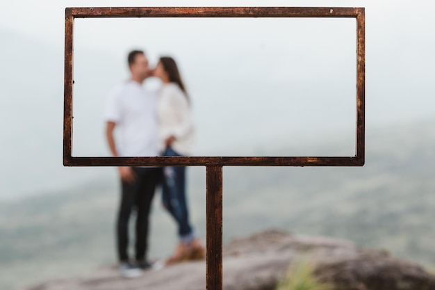 Premium Photo | Couple kissing while standing on rocks seen through ... Premium Photo | Couple kissing while standing on rocks seen through ...
