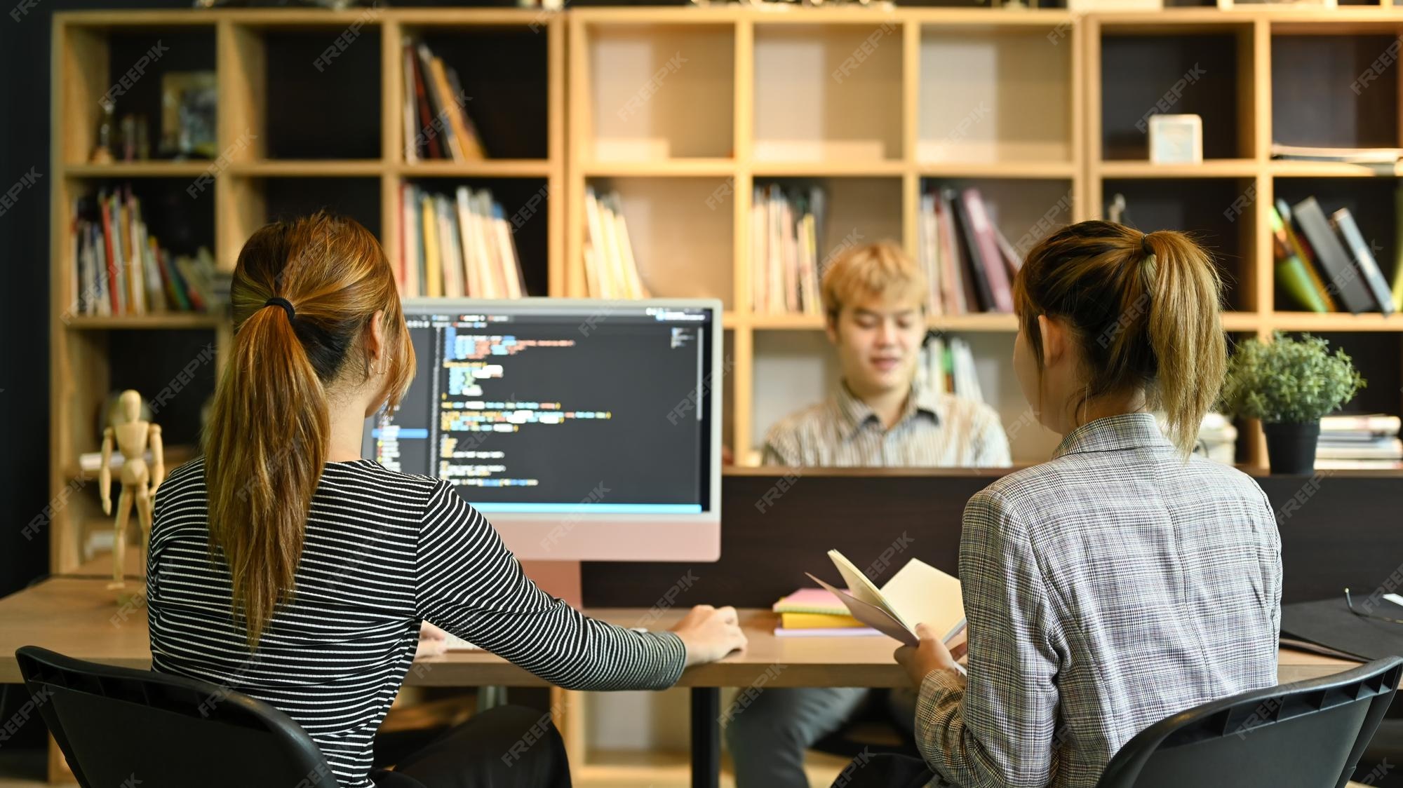 Premium Photo | Creative software development team working with data debugging improvement ...