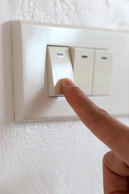 Premium Photo | Cropped hand pushing button at home Premium Photo | Cropped hand pushing button at home