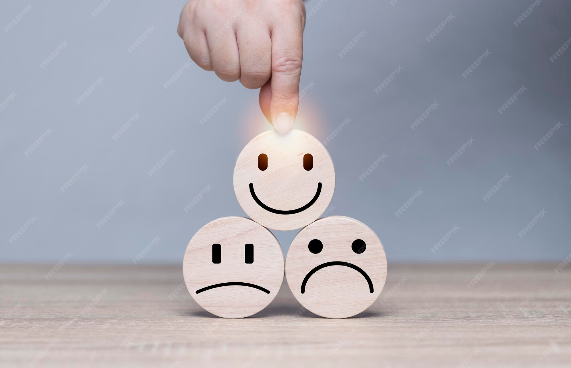 Premium Photo | Customer select wood smile face emoticon for rating ... Premium Photo | Customer select wood smile face emoticon for rating ...