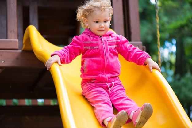Premium Photo Cute Girl Playing In Playground