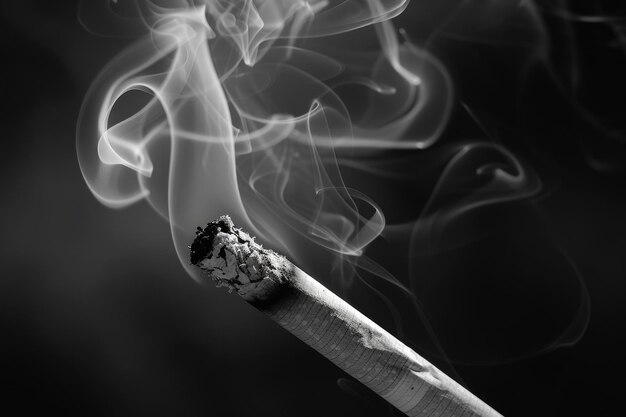 Detailed View Of A Cigarette Emitting Smoke Upward Wisps Of Smoke Spiraling Upwards From The