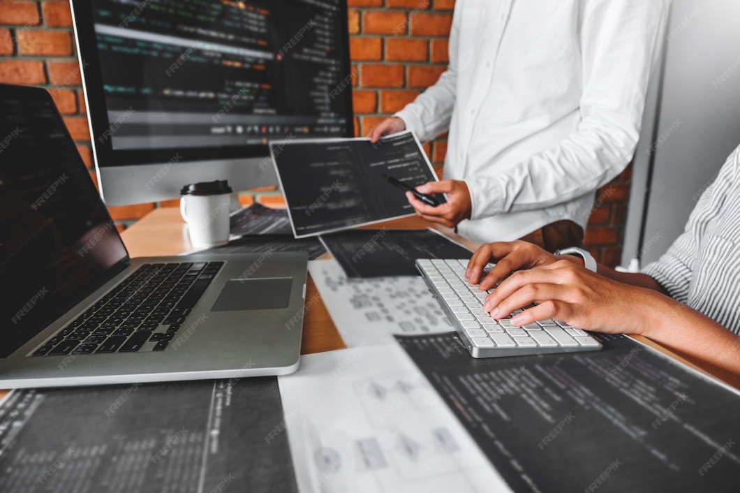 Premium Photo | Developing programmer reading computer codes ...
