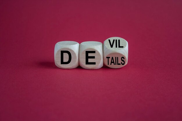 Premium Photo | Devil in the details symbol turned cubes and changed ... Premium Photo | Devil in the details symbol turned cubes and changed ...