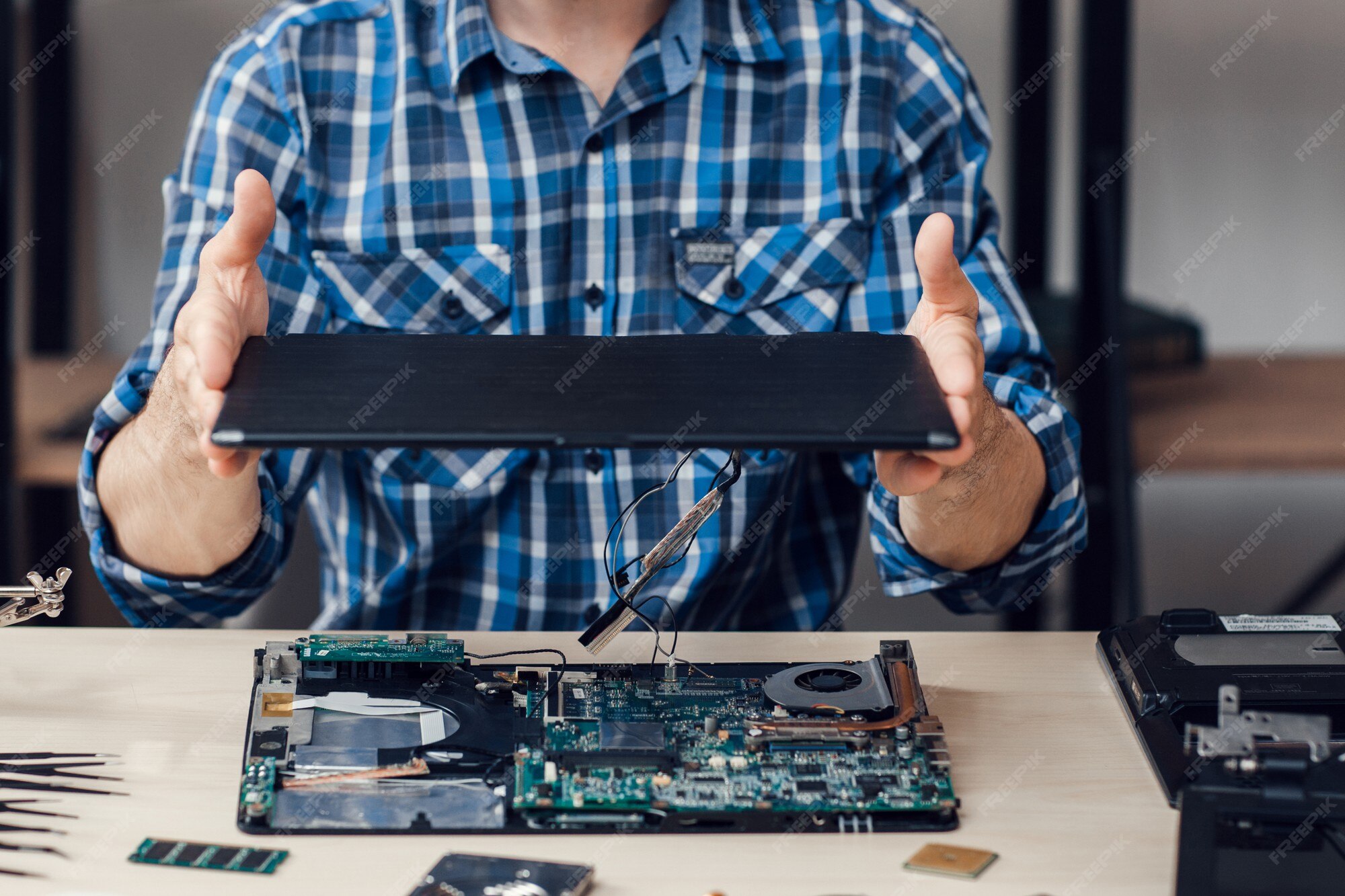 Premium Photo Disassembling Computer By Man In Repair Shop