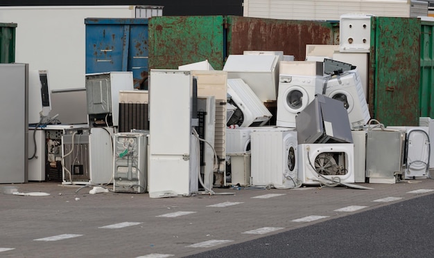 Premium Photo | Discarded household appliances in the garbage container ... Premium Photo | Discarded household appliances in the garbage container ...