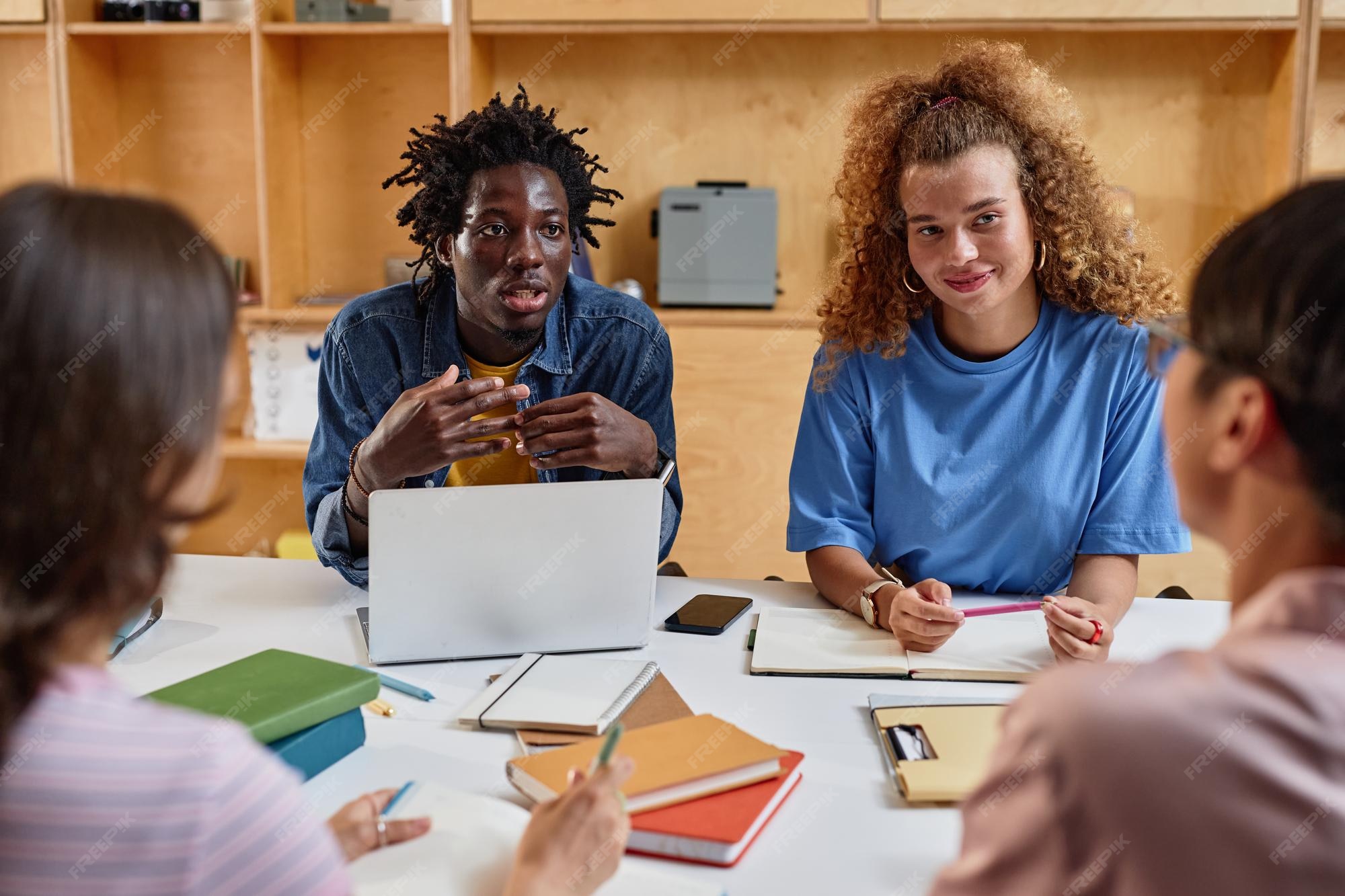 Premium Photo | Diverse group of young students working on project ... Premium Photo | Diverse group of young students working on project ...