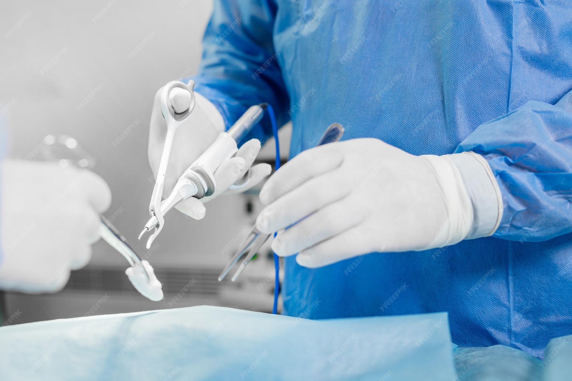 Premium Photo | Doctor using ultrasonic surgery scissors during ... Premium Photo | Doctor using ultrasonic surgery scissors during ...