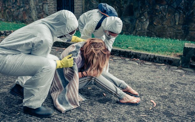 Premium Photo | Doctors wrapping patient with blanket at hospital Premium Photo | Doctors wrapping patient with blanket at hospital