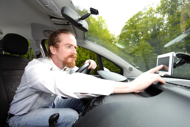 Premium Photo | Driver using GPS navigation a way Premium Photo | Driver using GPS navigation a way