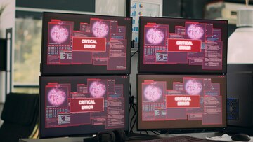 Premium Photo | Empty office with multiple monitors showing hacking attack alert, it agency ...