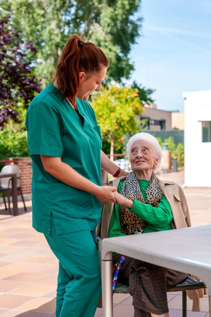 Premium Photo | Endearing care elderly woman embraces sunny serenity ... Premium Photo | Endearing care elderly woman embraces sunny serenity ...