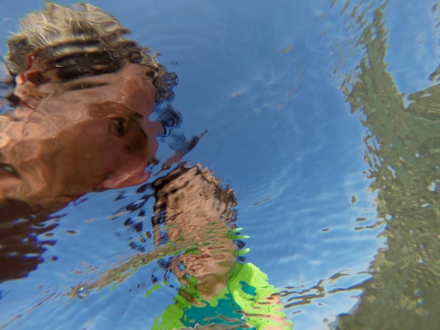 Premium Photo Father And Daughter Seen From Underwater