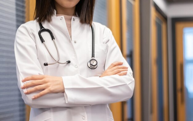 Premium Photo Female Doctor With Stethoscope And White Coat
