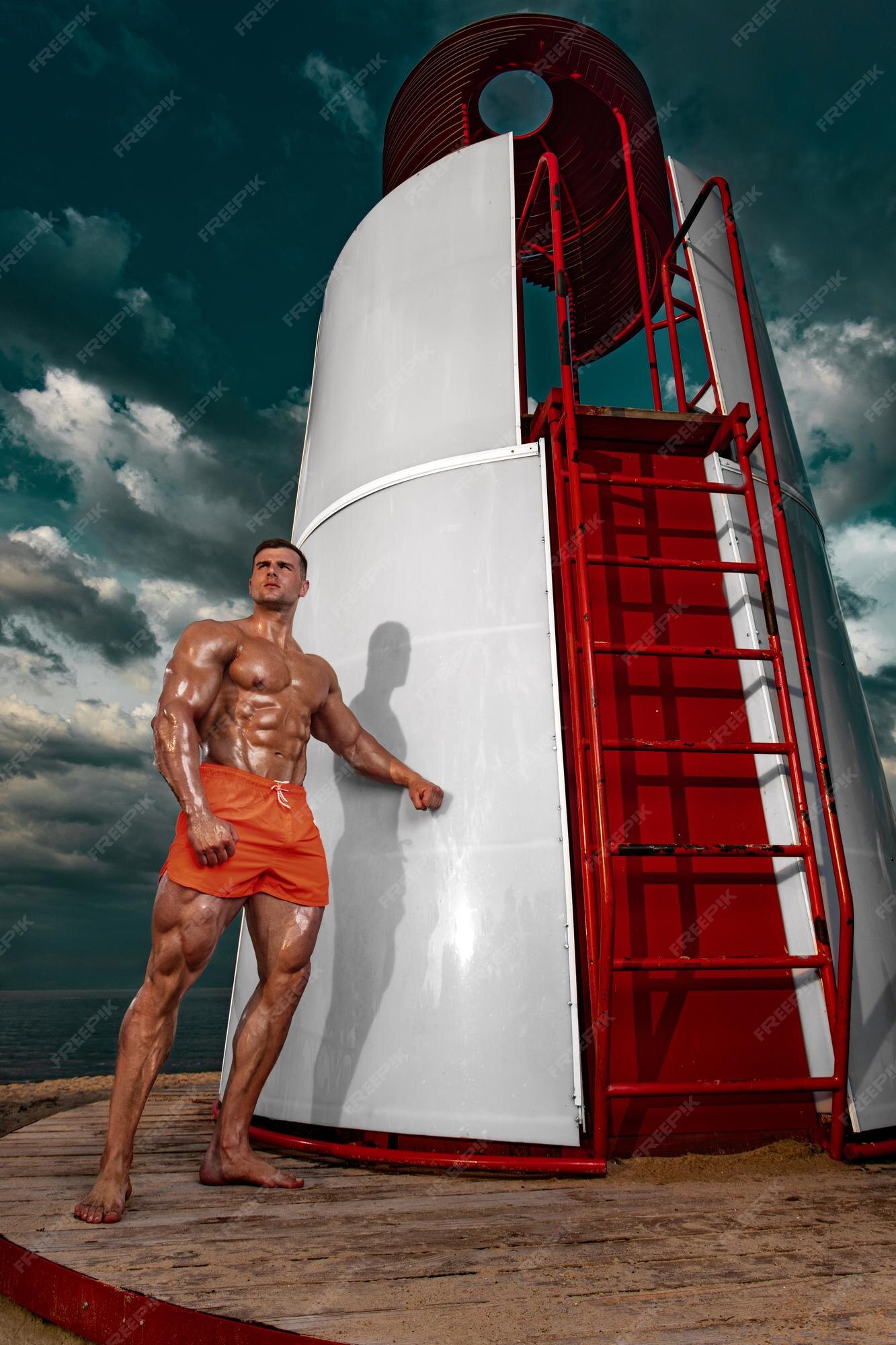 Premium Photo Fit Athlete Bodybuilder On The Beach Attractive Young