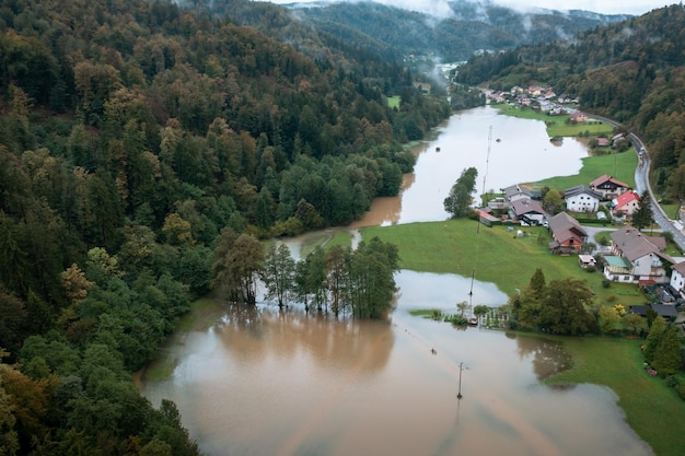 Premium Photo | Flooding water across river plains farmland and village ... Premium Photo | Flooding water across river plains farmland and village ...