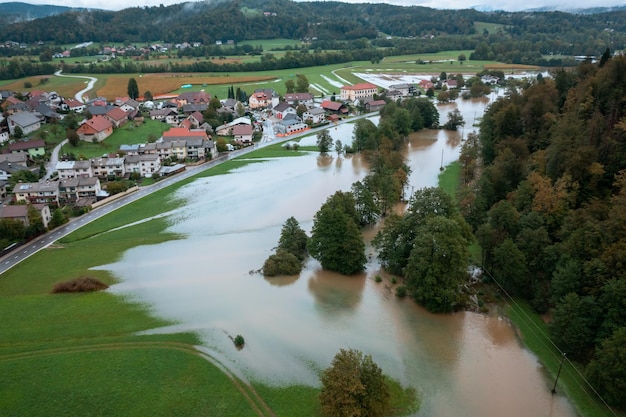 Premium Photo | Flooding water across river plains farmland and village ... Premium Photo | Flooding water across river plains farmland and village ...