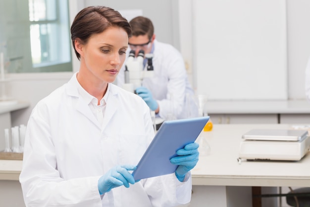 Premium Photo | Focus scientist using tablet pc Premium Photo | Focus scientist using tablet pc