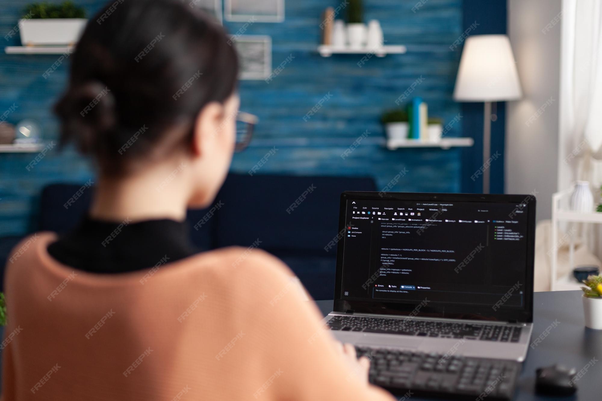 Premium Photo | Freelancer programming software on laptop. programmer working remote from home ...