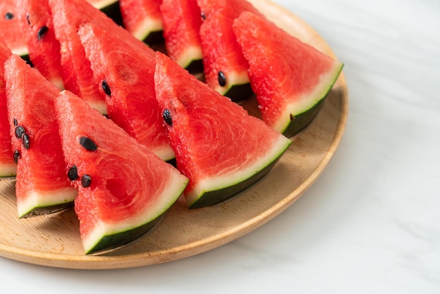 Premium Photo | Fresh watermelon sliced on plate Premium Photo | Fresh watermelon sliced on plate