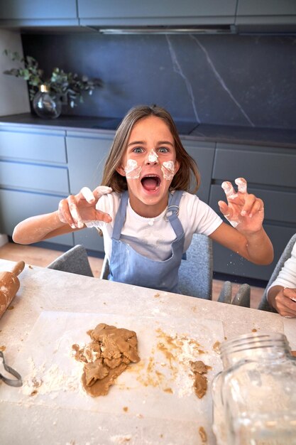 Premium Photo | Funny girl making grimace while cooking Premium Photo | Funny girl making grimace while cooking
