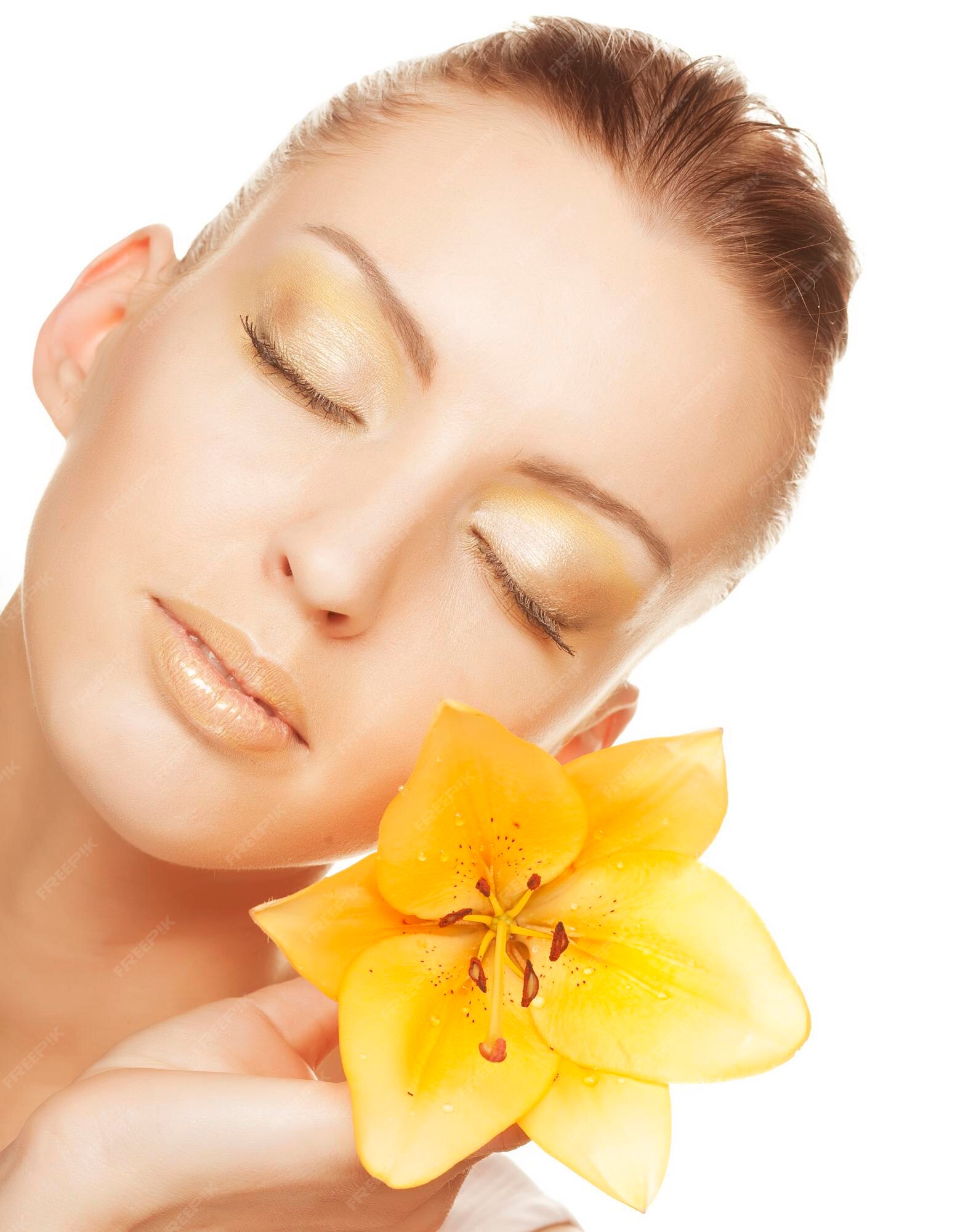 Premium Photo Girl Holding Orchid Flower Over White Background