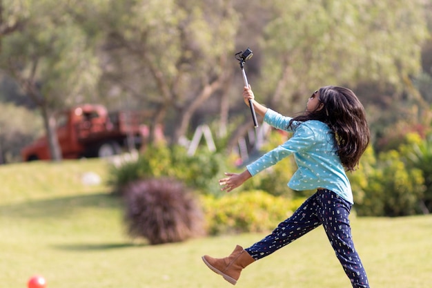 Premium Photo Girl Taking Selfie While Standing On Land