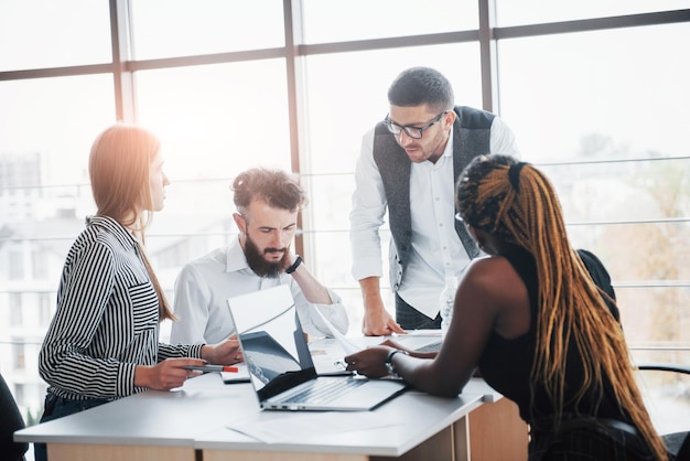Premium Photo | A group of multinational busy people working in the office Premium Photo | A group of multinational busy people working in the office