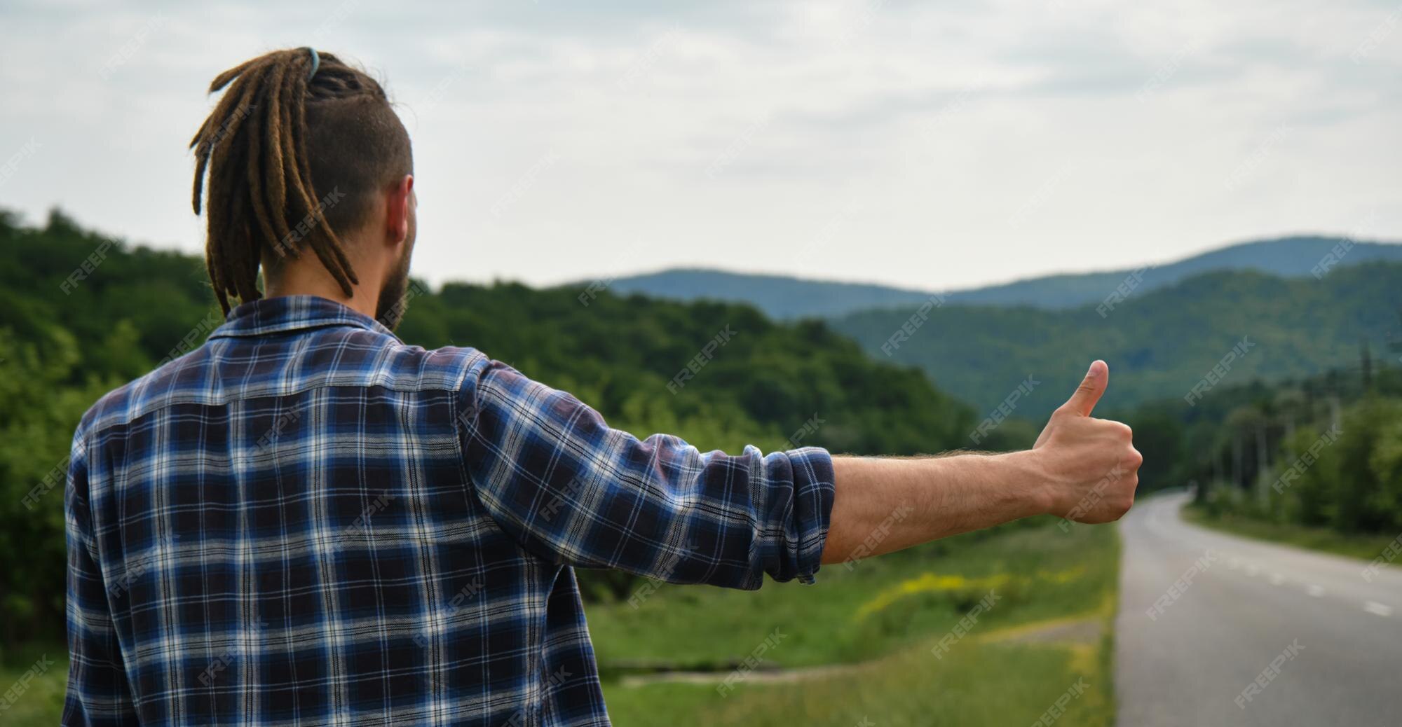 Premium Photo | Guy went on trip alone trying to stop car outstretched ... Premium Photo | Guy went on trip alone trying to stop car outstretched ...