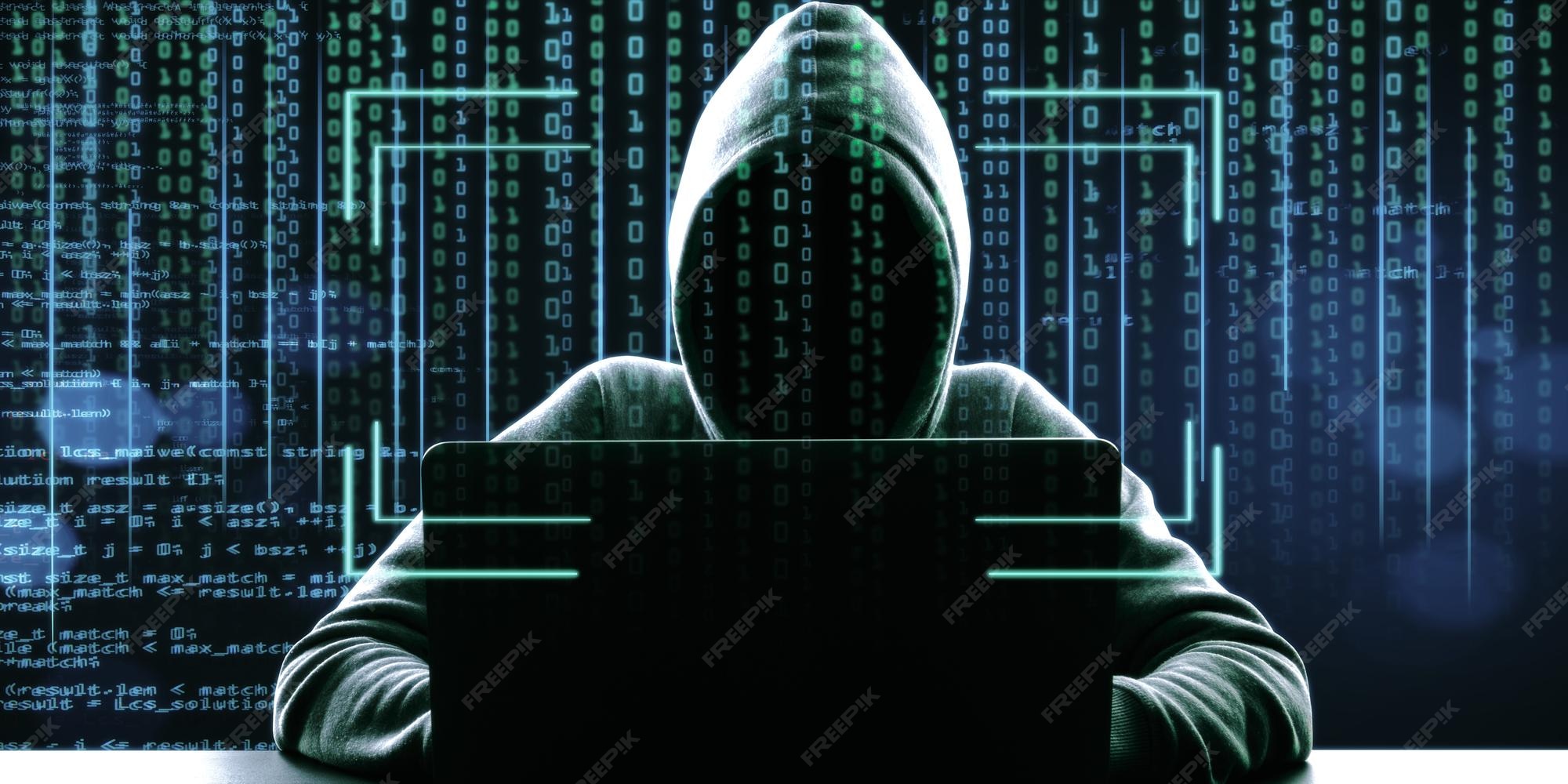 Premium Photo Hacker In Hoodie Using Laptop At Desktop On Abstract Binary Code Background With