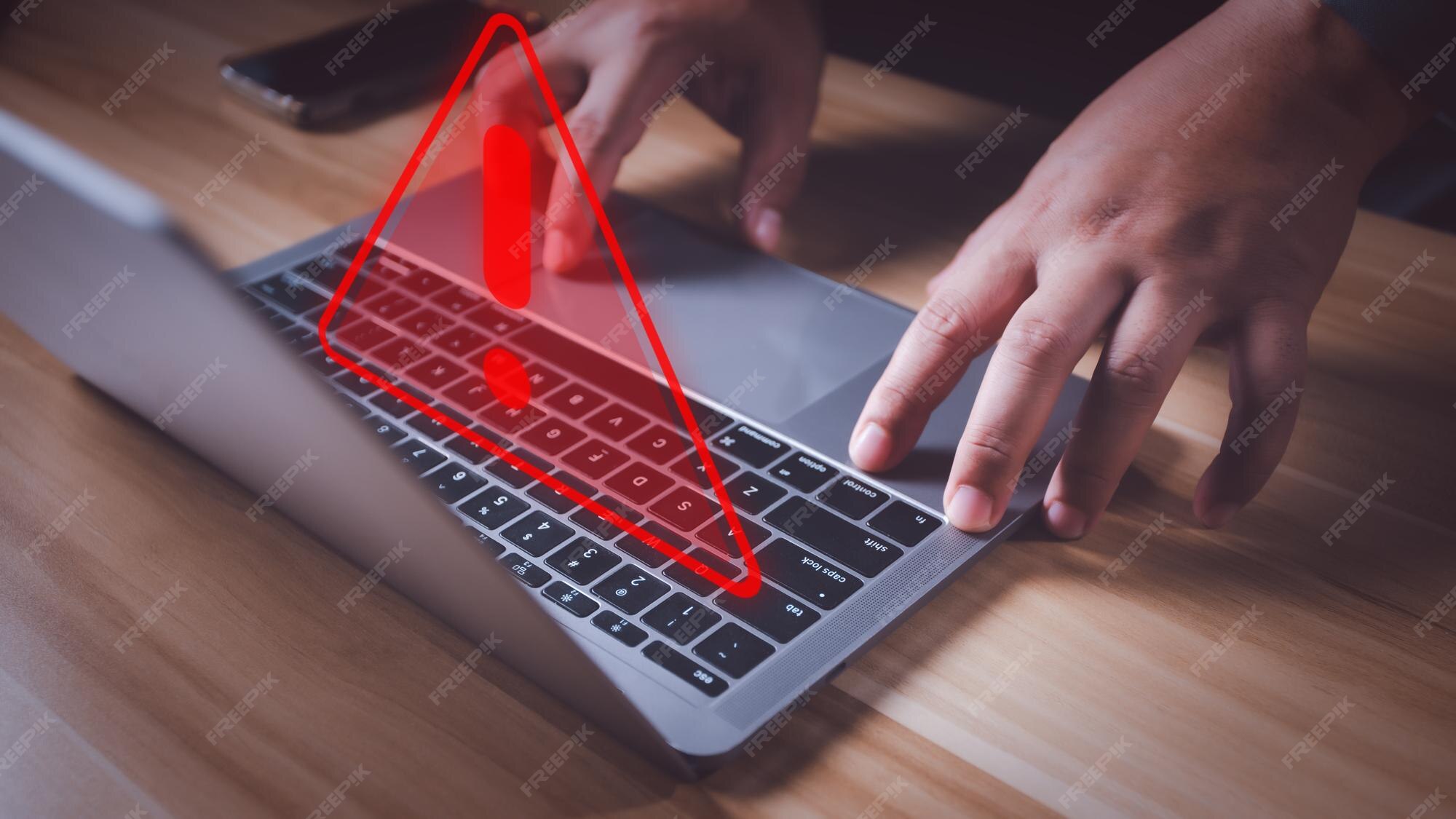 Premium Photo Hacker Or Programmer Using Laptop With Triangle Caution Warning Sign Coding 