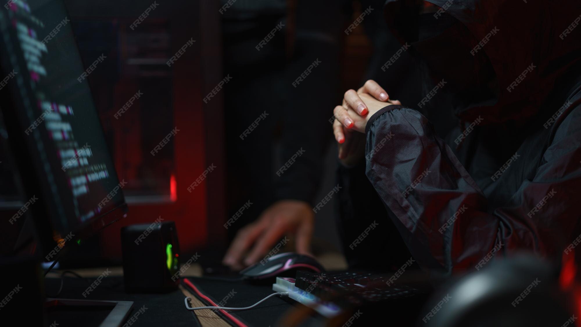 Premium Photo | Hacker team looking code on screen concentrated while ...