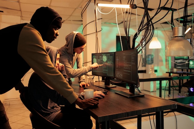 Premium Photo Hackers Team Hacking Computer Network System Programming Malware Cyberwarfare