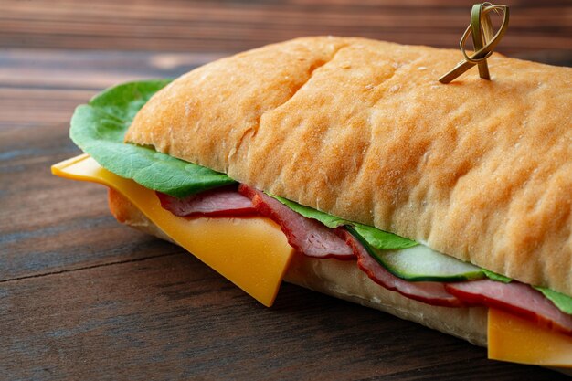 Premium Photo | Ham sandwich with cheese and lettuce on table Premium Photo | Ham sandwich with cheese and lettuce on table