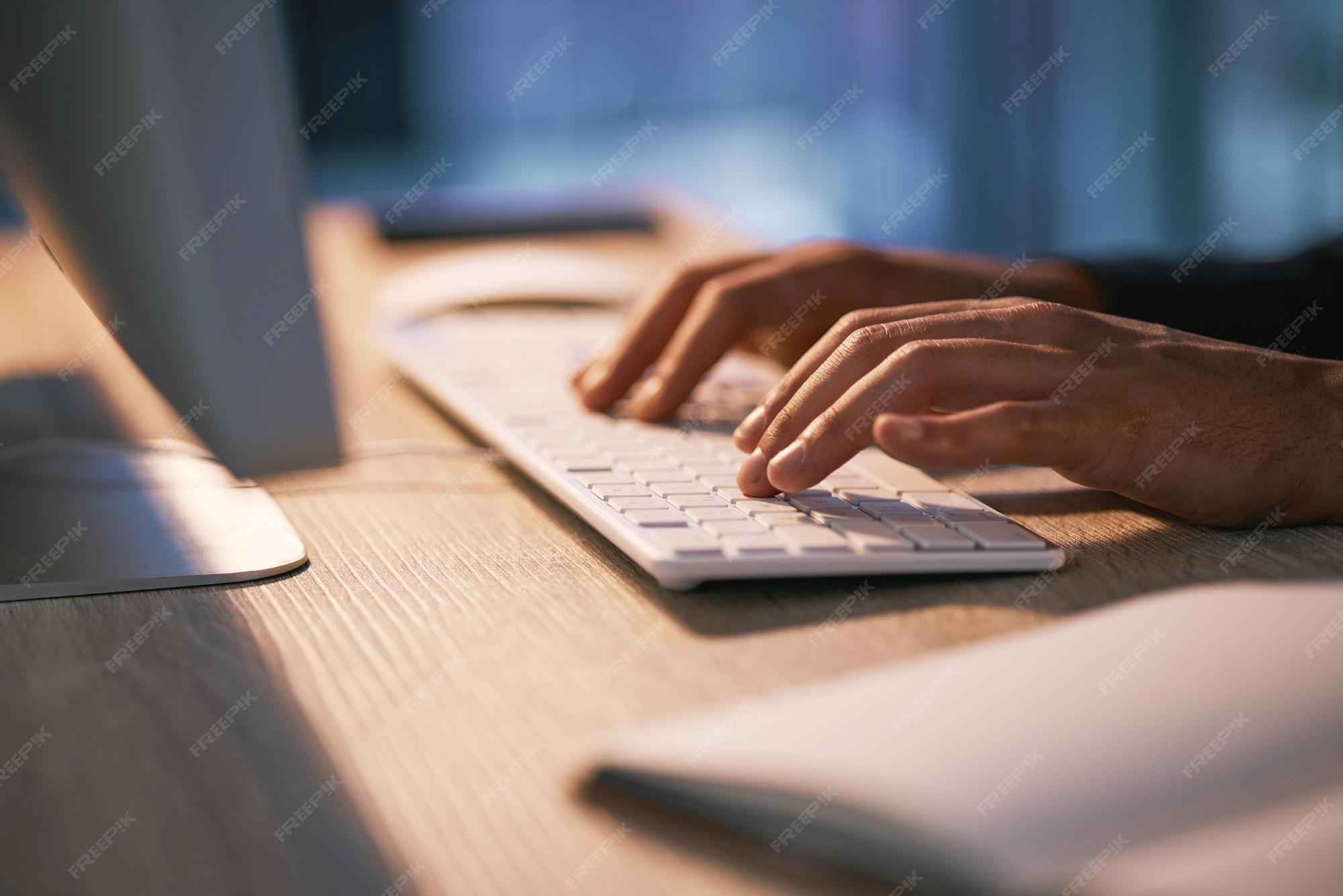 Premium Photo | Hands of business person typing on computer keyboard in ...