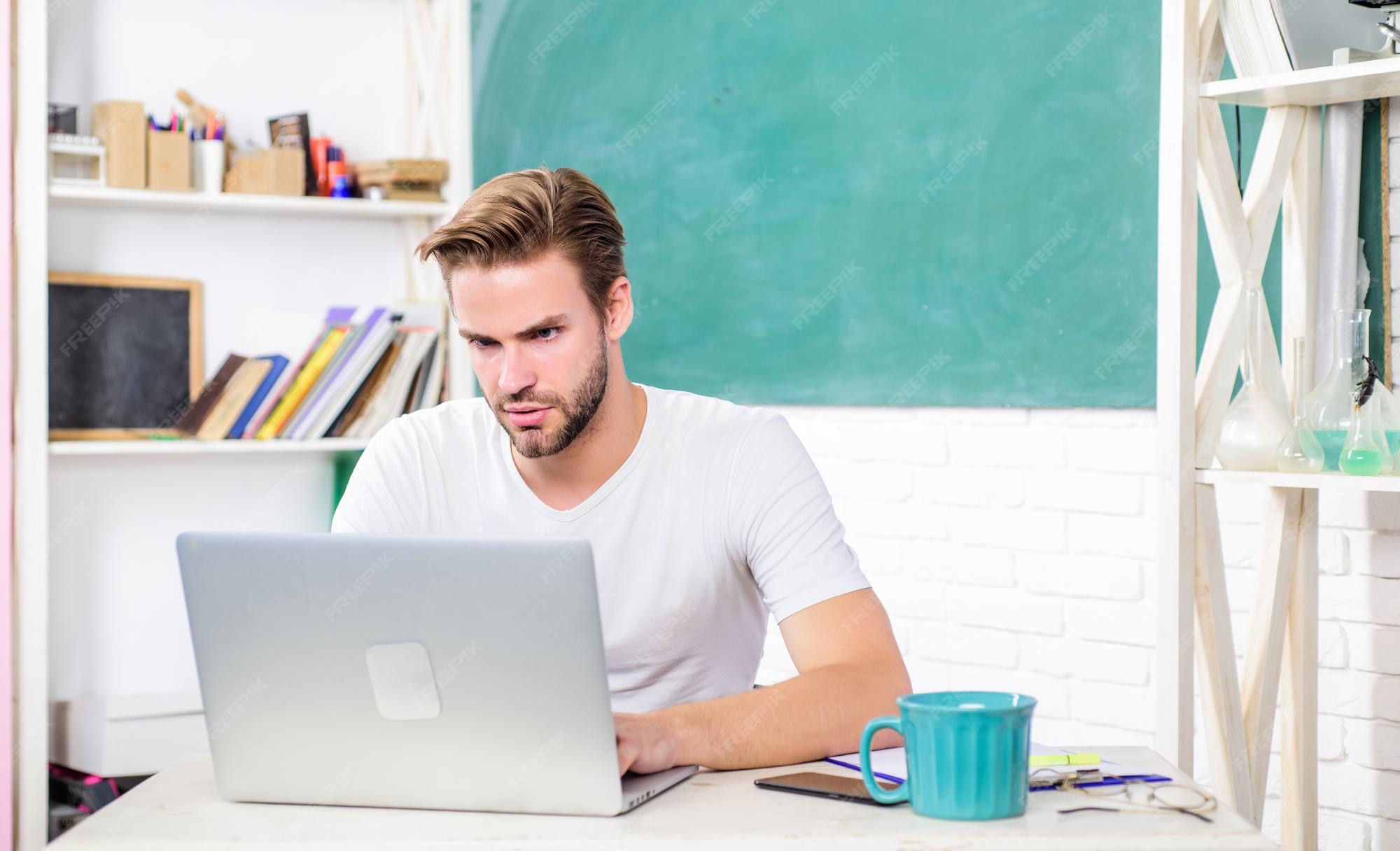 Premium Photo | Handsome man use modern technology improve knowledge ...