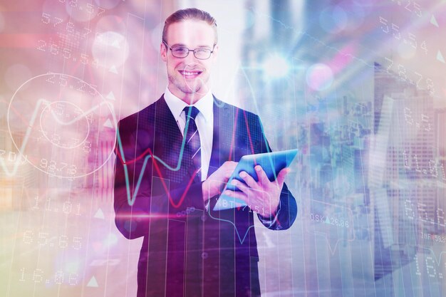 Premium Photo Happy Businessman Using His Tablet Pc Against Room With