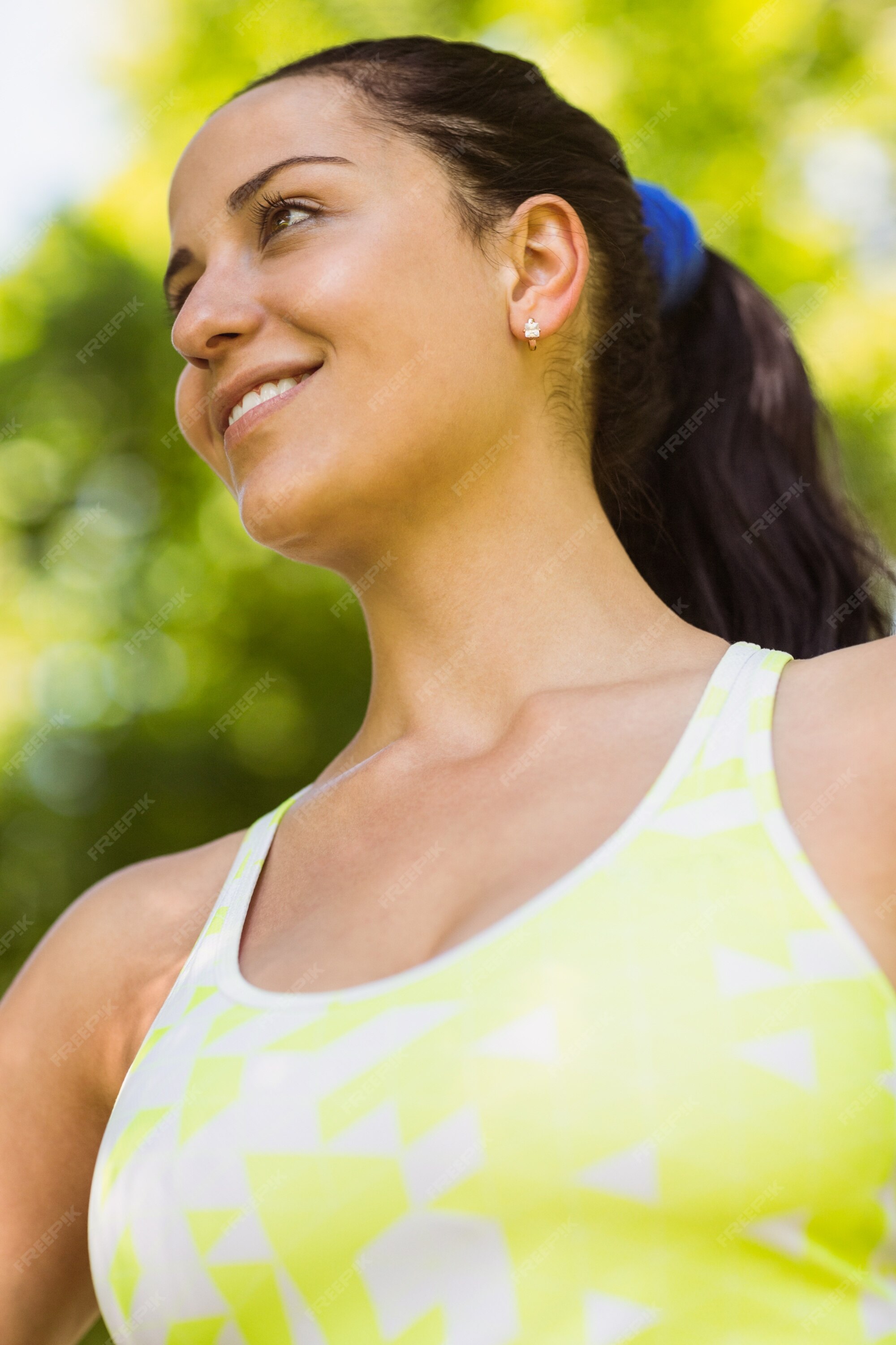 Premium Photo Happy Fit Brunette Posing In The Park